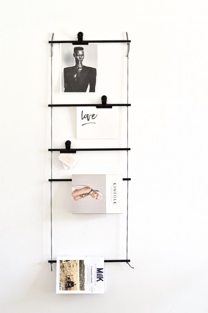 Display your art (and more) on this DIY hanging dowel ladder - DIY home ...